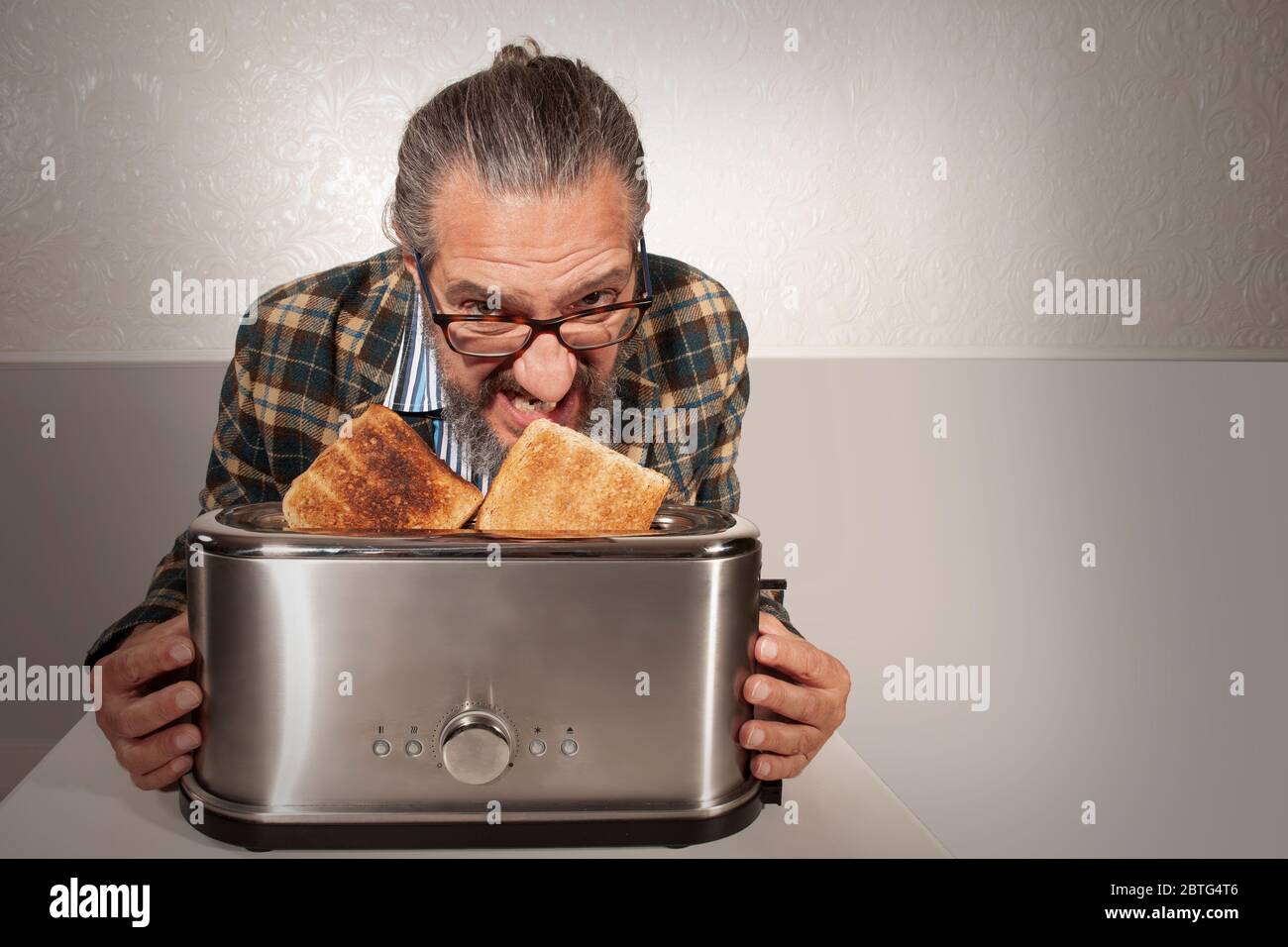 Person toast toaster hi-res stock photography and images - Alamy