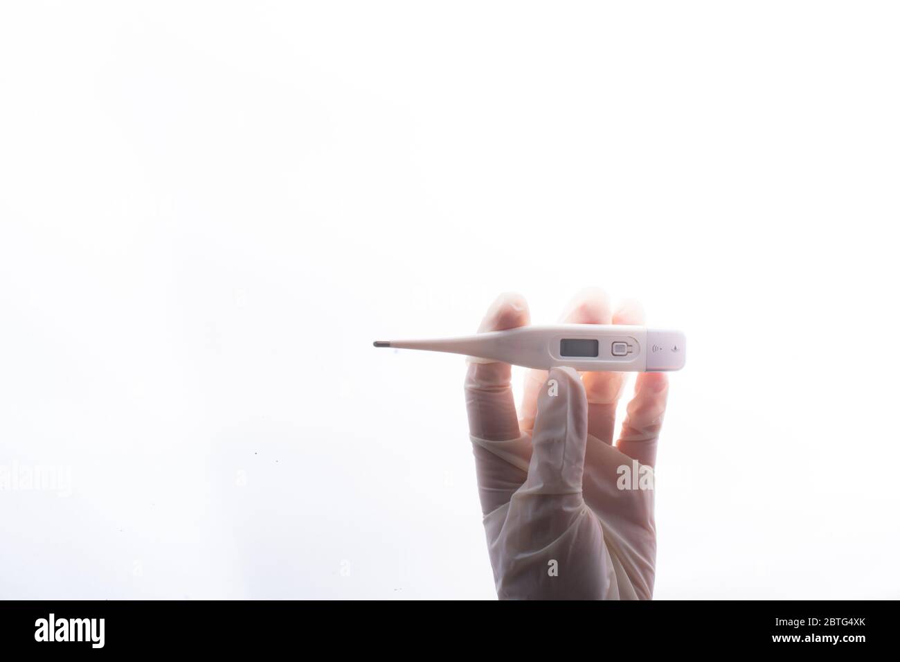 measuring Fever temperature. with thermometer. World pandemic concept ...