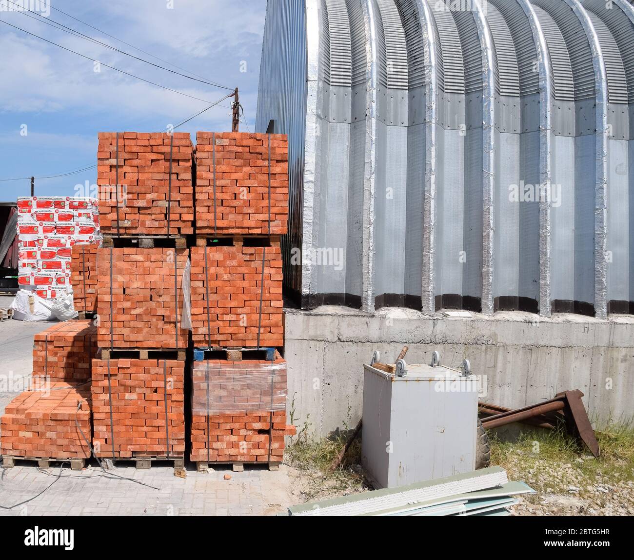 Warehouse of building materials. a Building base, metal, wood and ...