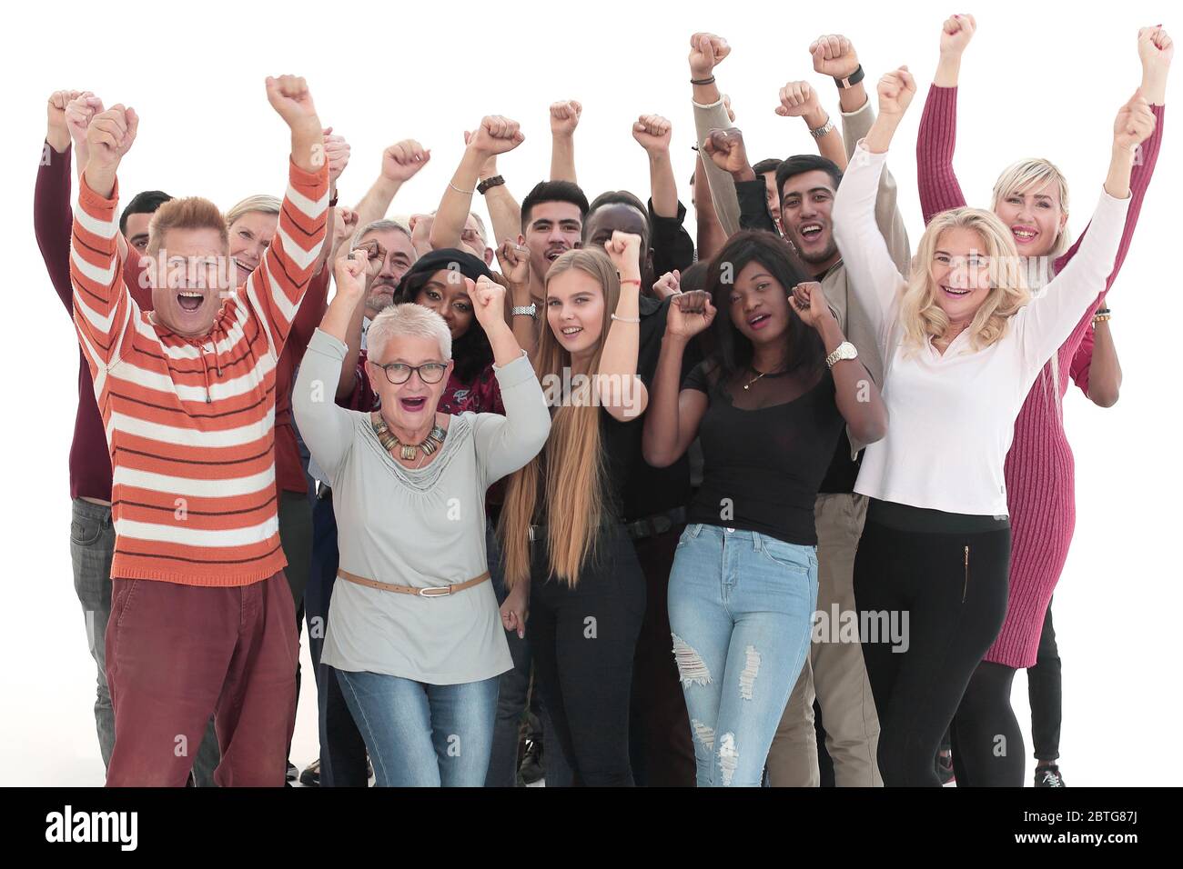 group of happy people standing with their hands up Stock Photo - Alamy