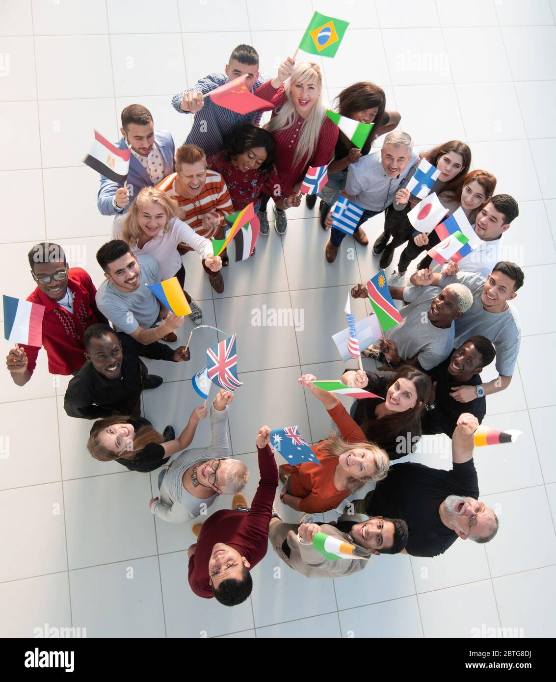 Top view of people with flags standing in circle Stock Photo - Alamy