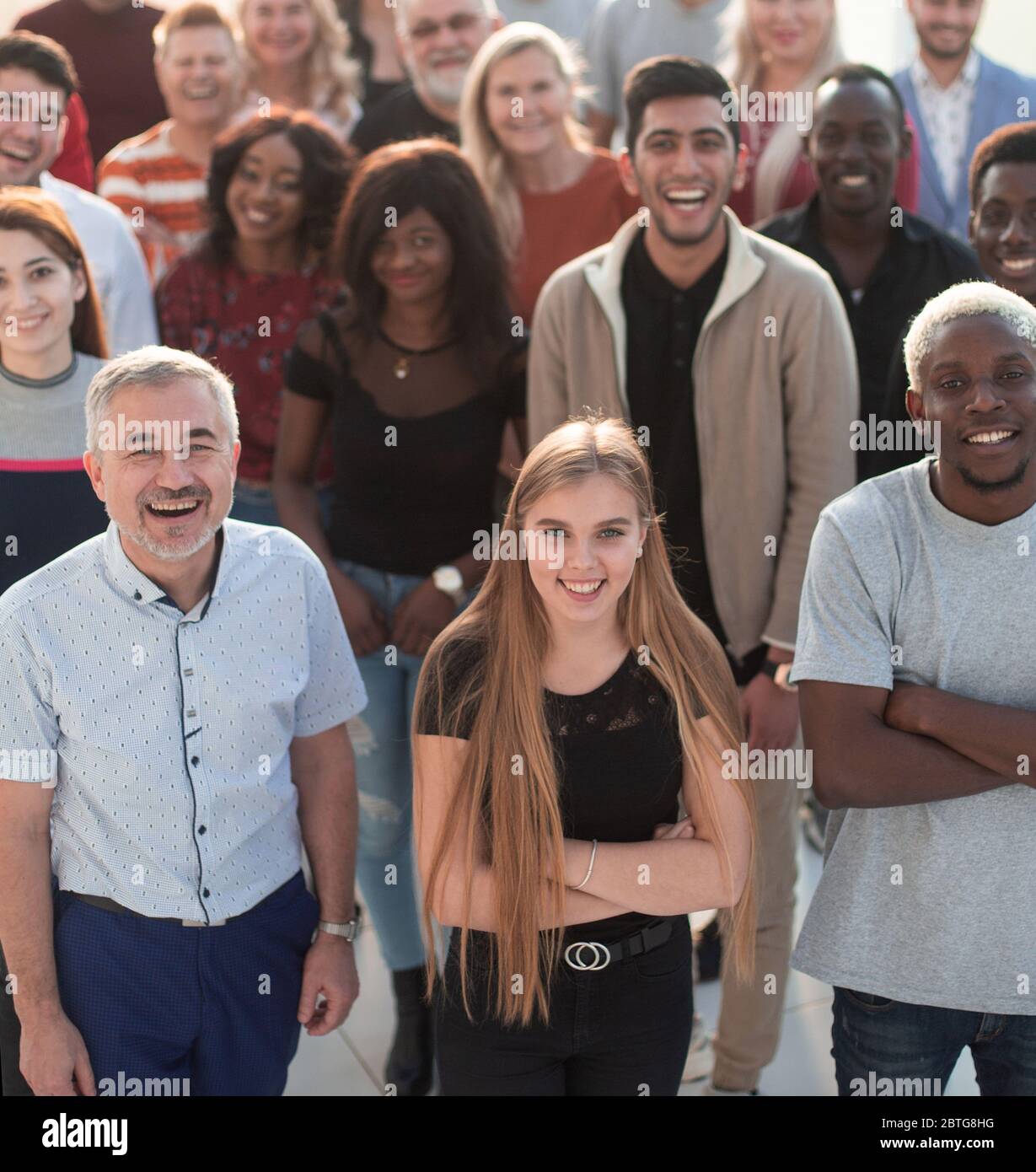 multi ethnic group of different people standing together Stock Photo ...