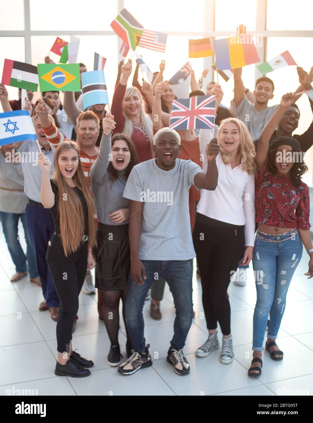 Top view young multi ethnic business people group waving flags Stock ...