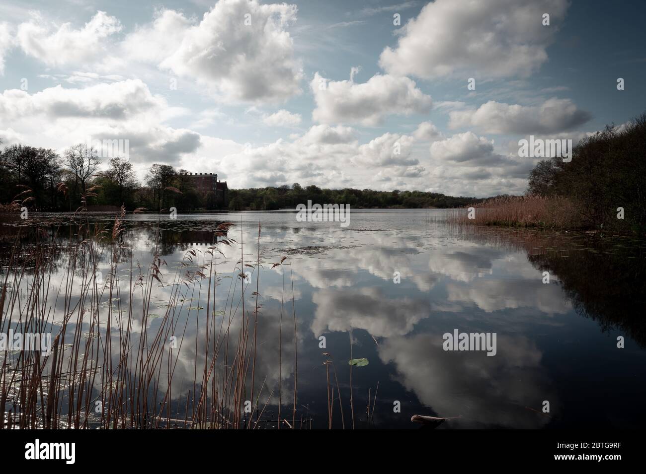 The dramatic sky and clouds reflects beautifully in the lake Svaneholm ...