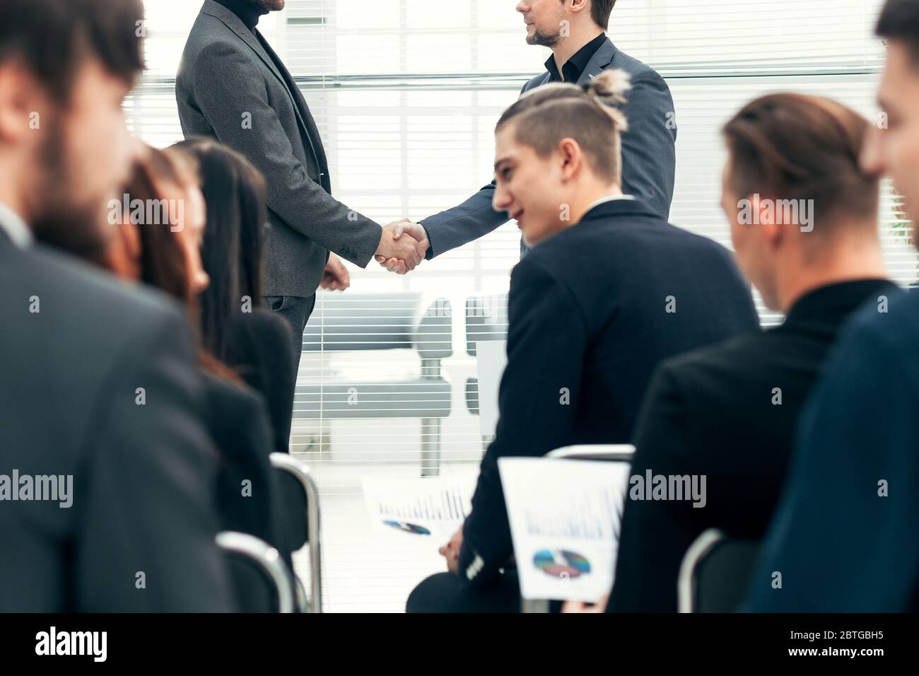 Group company employees congratulating hi-res stock photography and ...