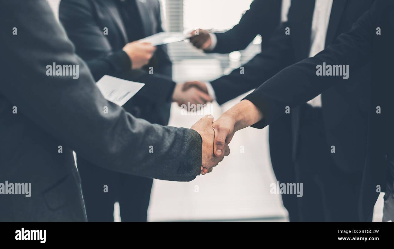 financial partners shaking hands. concept of cooperation Stock Photo ...