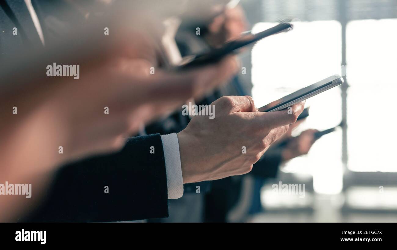 Image people holding smartphones hi-res stock photography and images ...