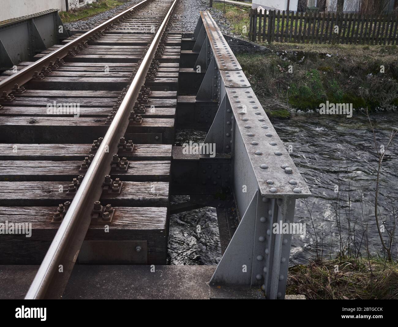 Perspective view of railroad tracks and small steel bridge Stock Photo ...