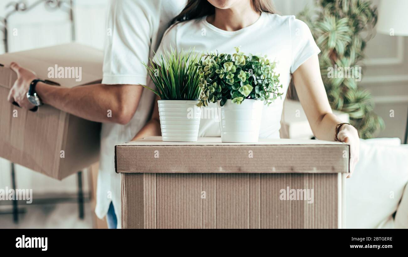 close up. young couple arranging boxes in their new apartment Stock ...