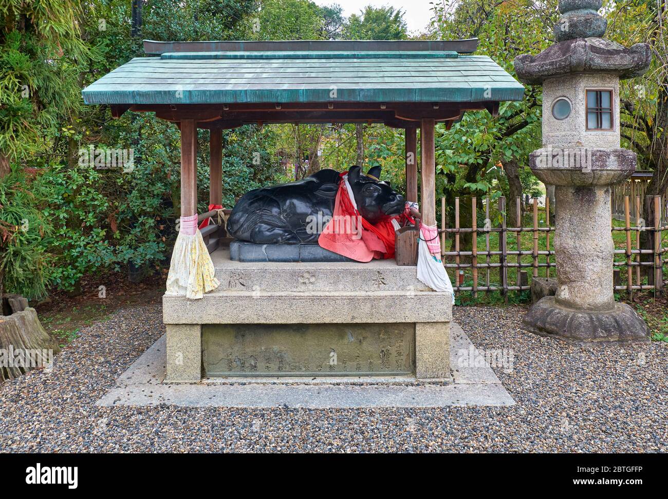 KYOTO, JAPAN - OCTOBER 17, 2019: The statue of ox, the animal messenger ...