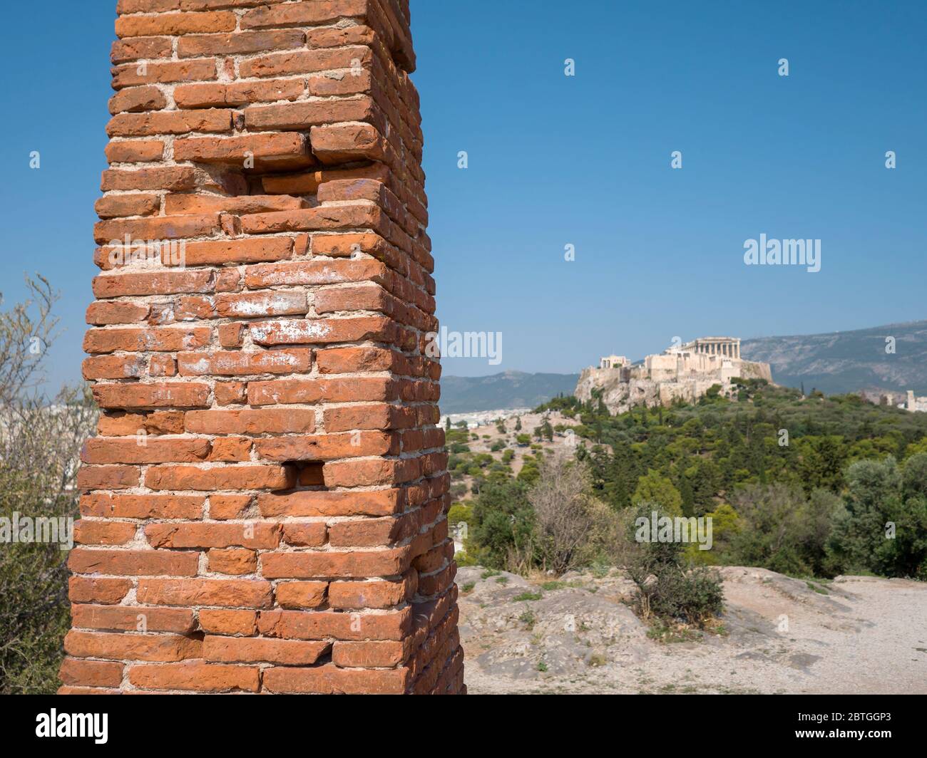 The view of Parthenon temple and the Acropolis hill from pnyx in Athens ...