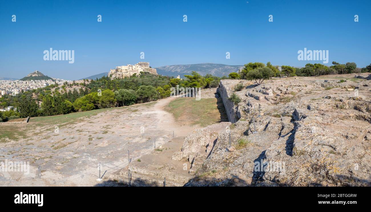 The view of Parthenon temple and the Acropolis hill from Pnyx in Athens ...
