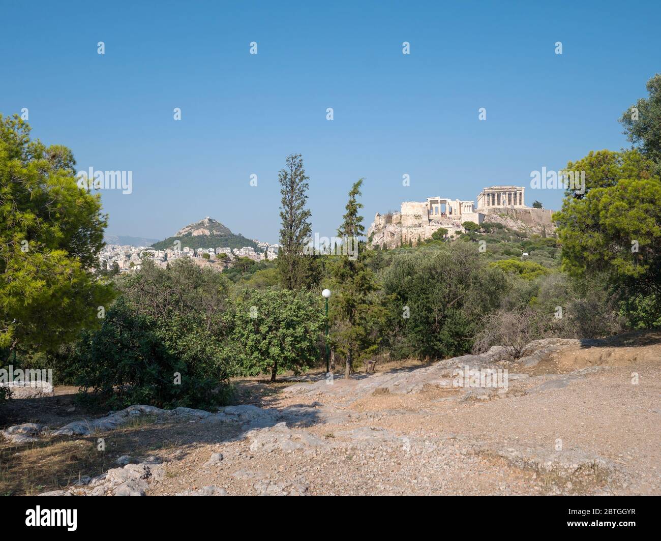 The view of Parthenon temple and the Acropolis hill from Pnyx in Athens ...