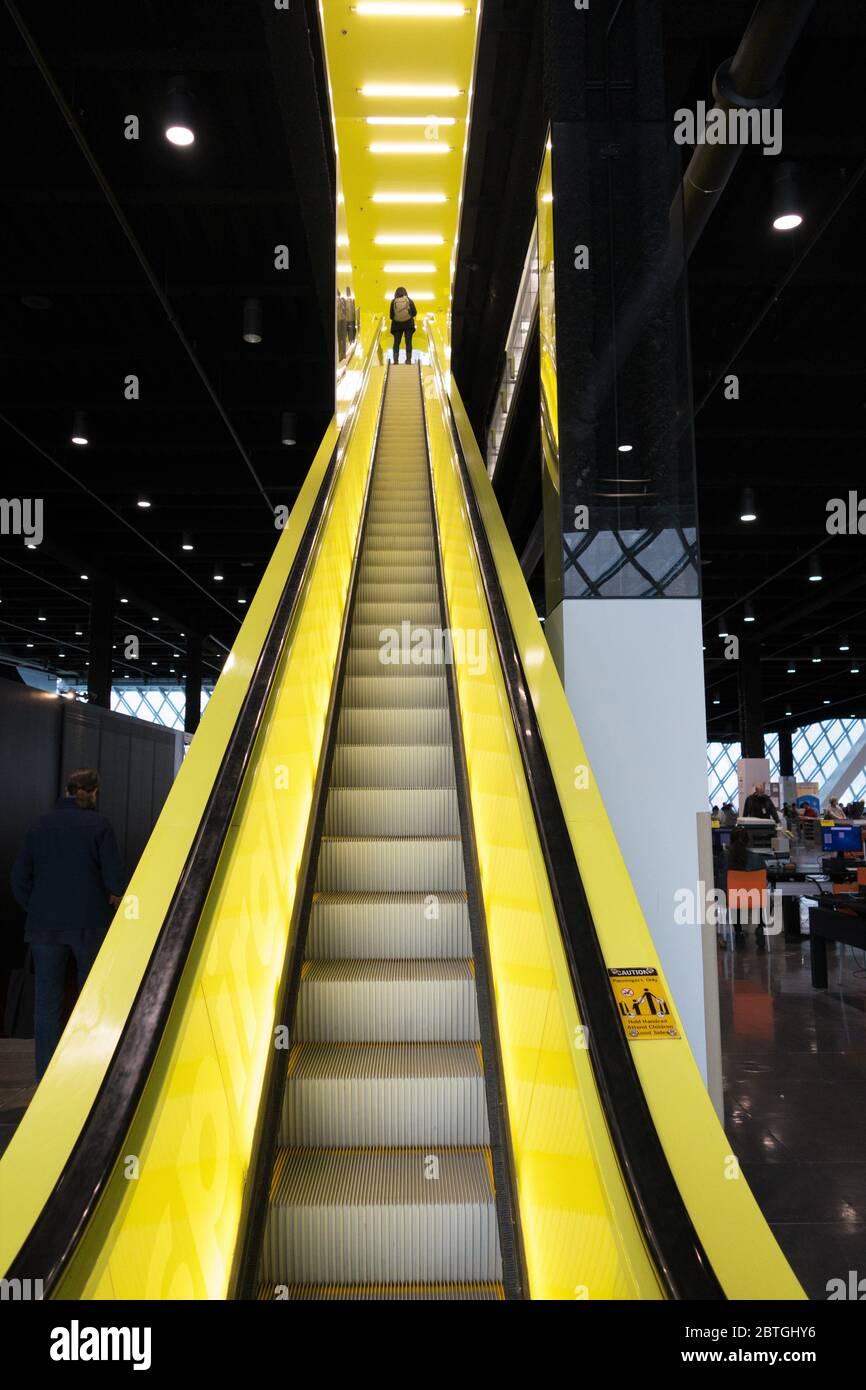 Riding an escalator hi-res stock photography and images - Alamy