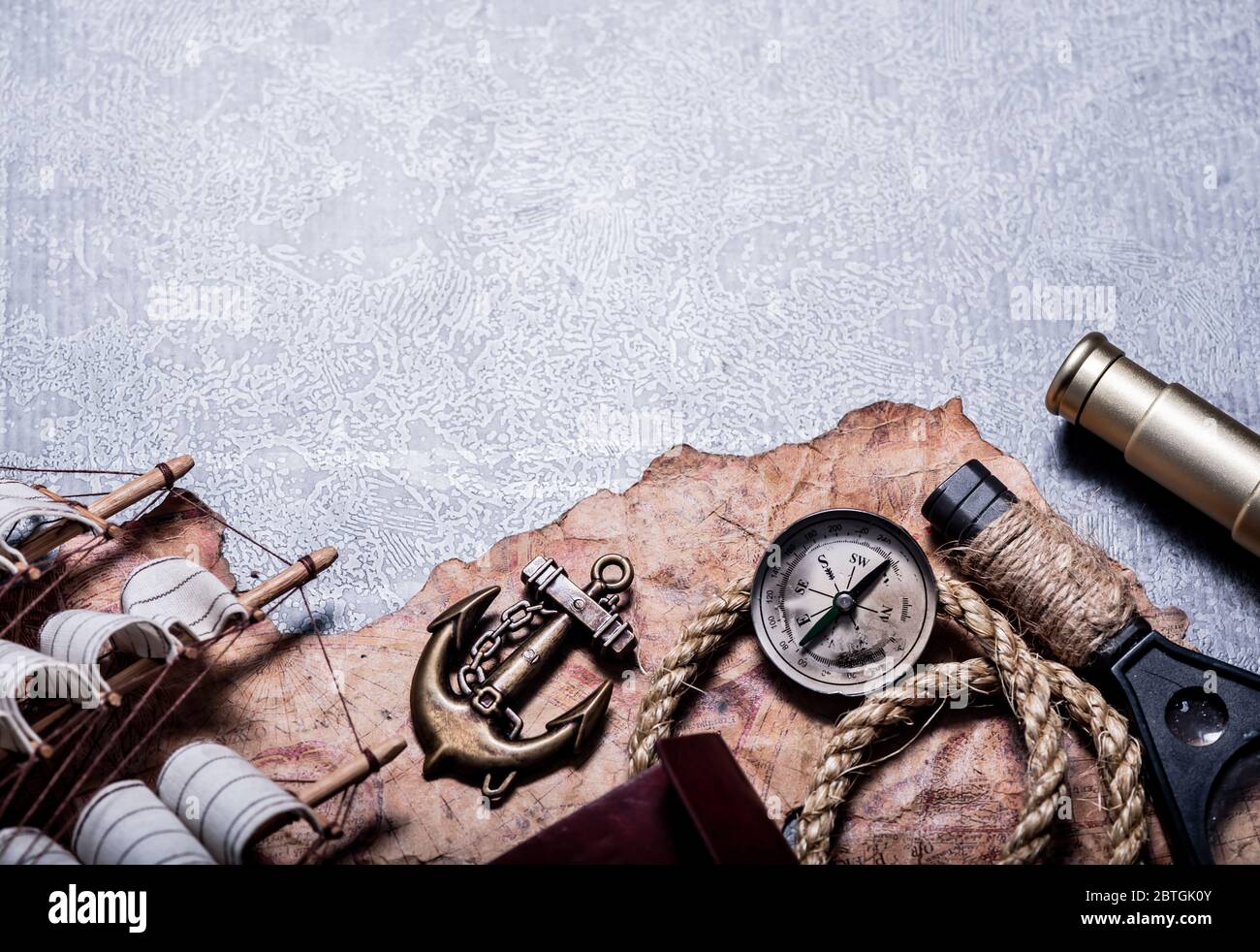 Columbus Day concept. Pirates and treasure with vintage worldmap and ...
