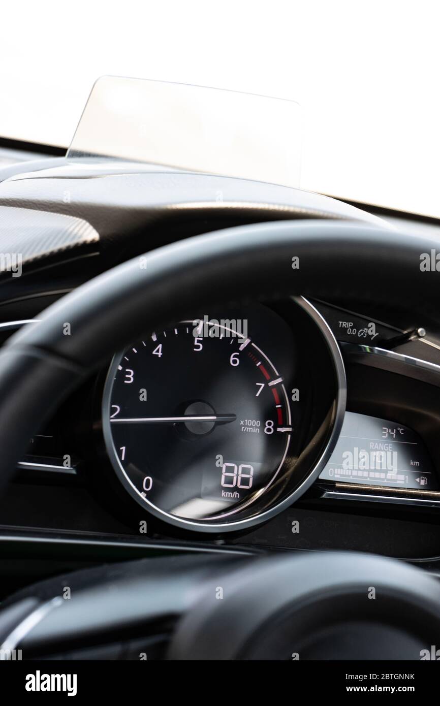 A dashboard with tachometer of car, close up. Dashboard in vehicle with ...
