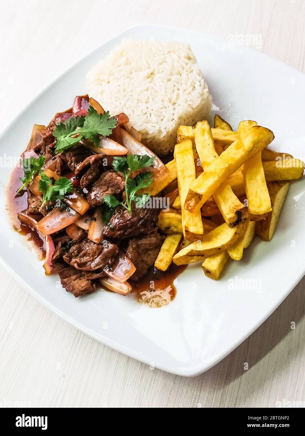 Traditional Peruvian dish Lomo Saltado (Beef saltado). Lomo saltado is ...