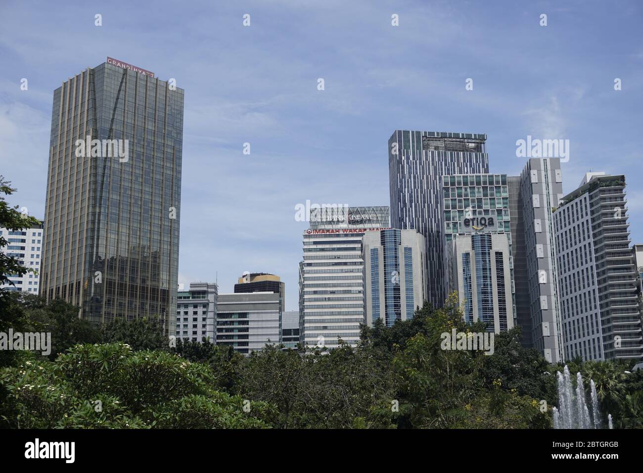 skyscraper office buildings in Kuala Lumpur, viewed from KLCC park ...