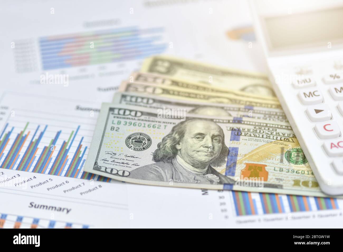Exchange rate concept. Dollars bills and Diagram of stock market prices ...