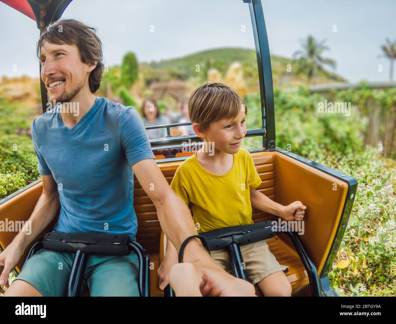 Group people on rollercoaster ride hi-res stock photography and images ...
