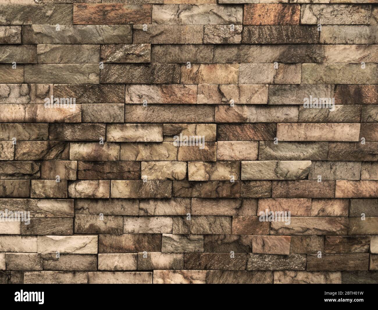 Colored bricks, paving stones, stacked as a wall, as a background Stock ...