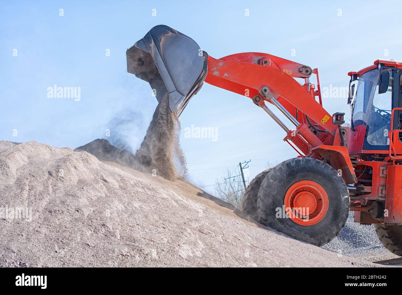 Mining industry. heavy wheel loader loading granite rock or ore at ...