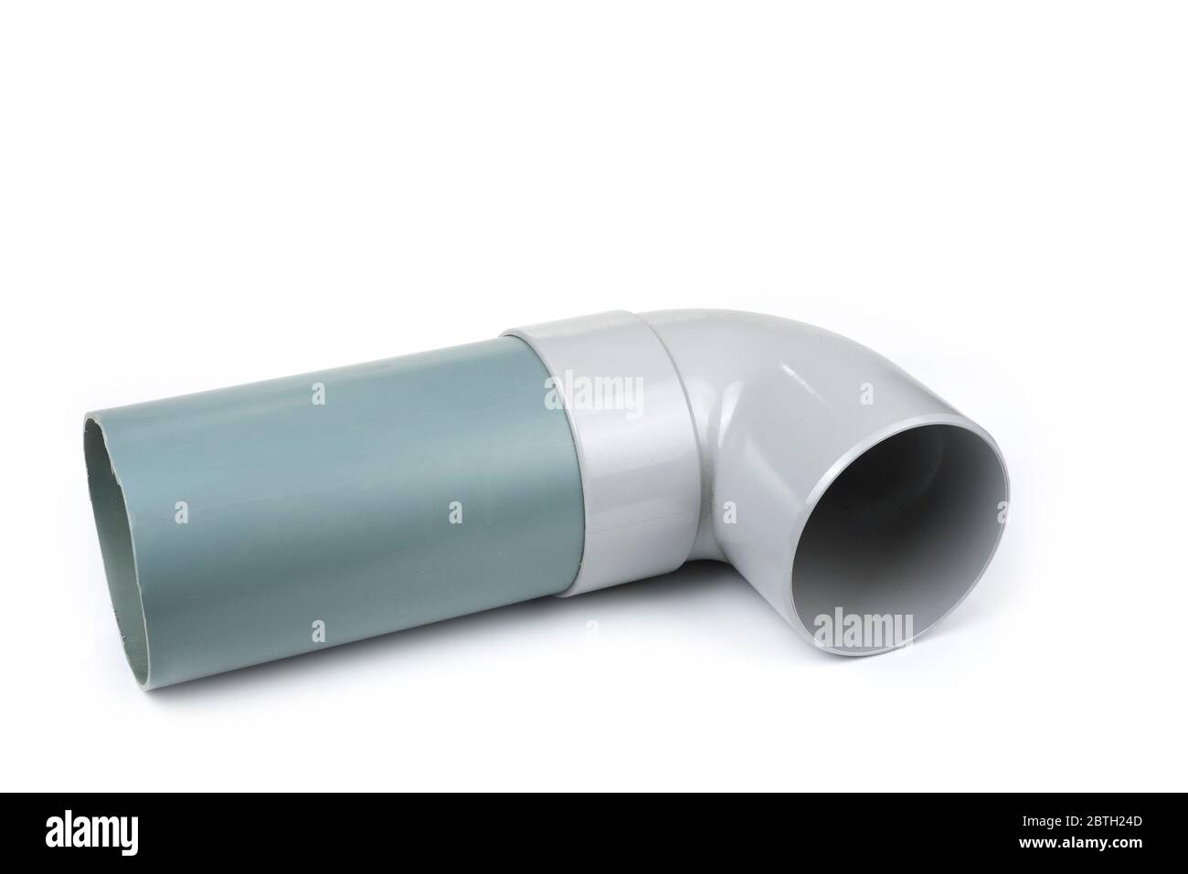 Plastic sewage tube with a knee fitting Stock Photo - Alamy