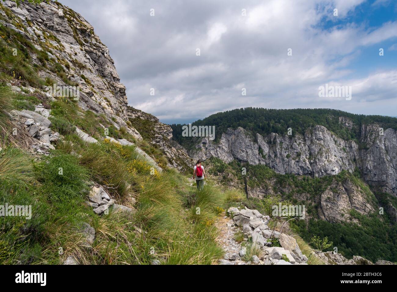Female hiker on mountain pathway, Ligurian Alps, Italy Stock Photo - Alamy