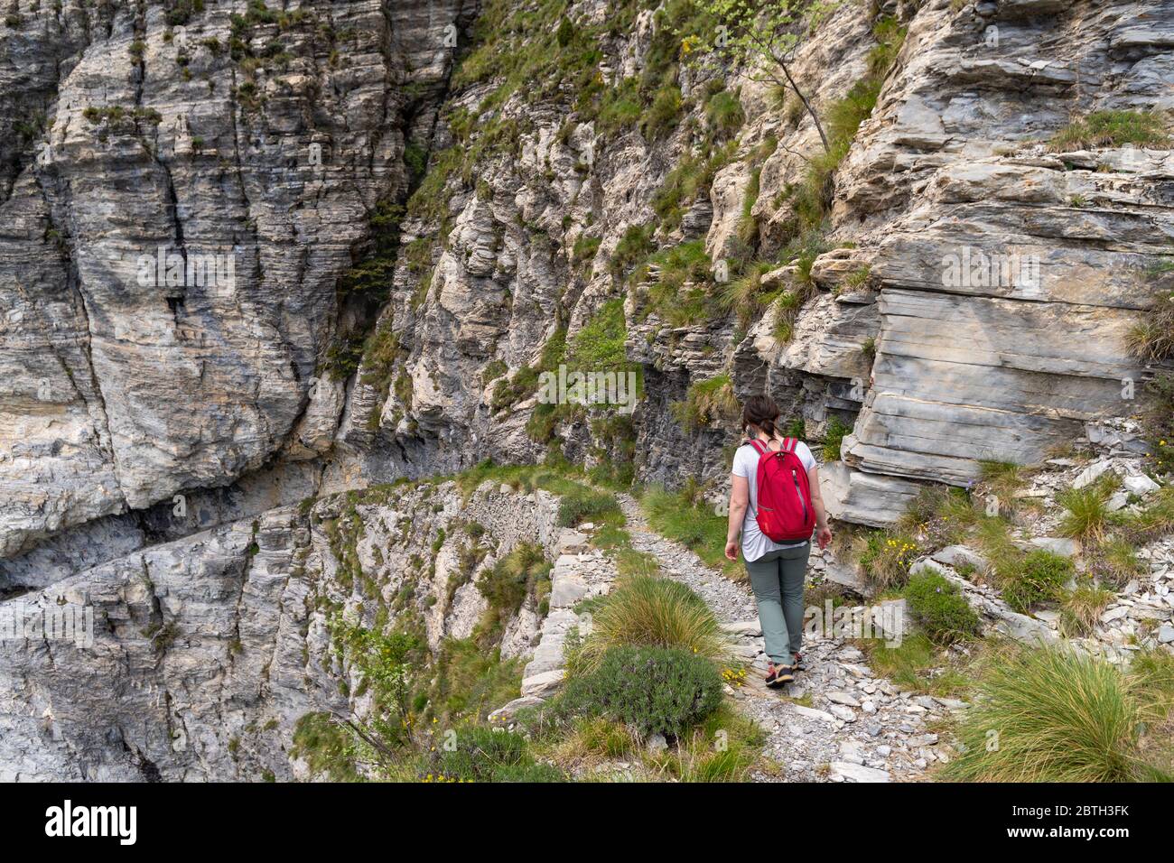 Female hiker on mountain pathway, Ligurian Alps, Italy Stock Photo - Alamy