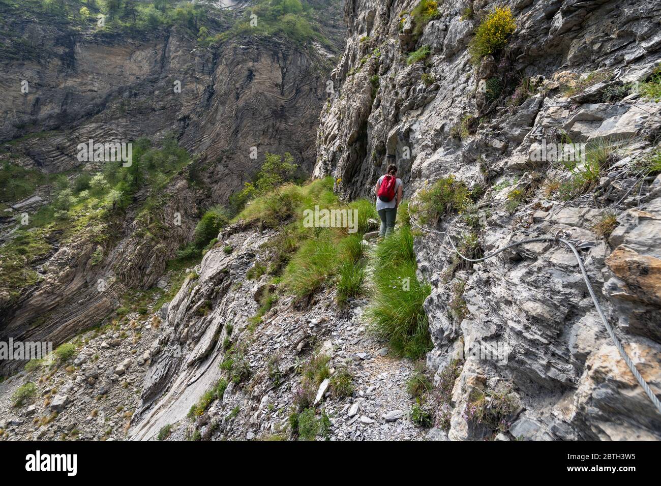 Female hiker on mountain pathway, Ligurian Alps, Italy Stock Photo - Alamy