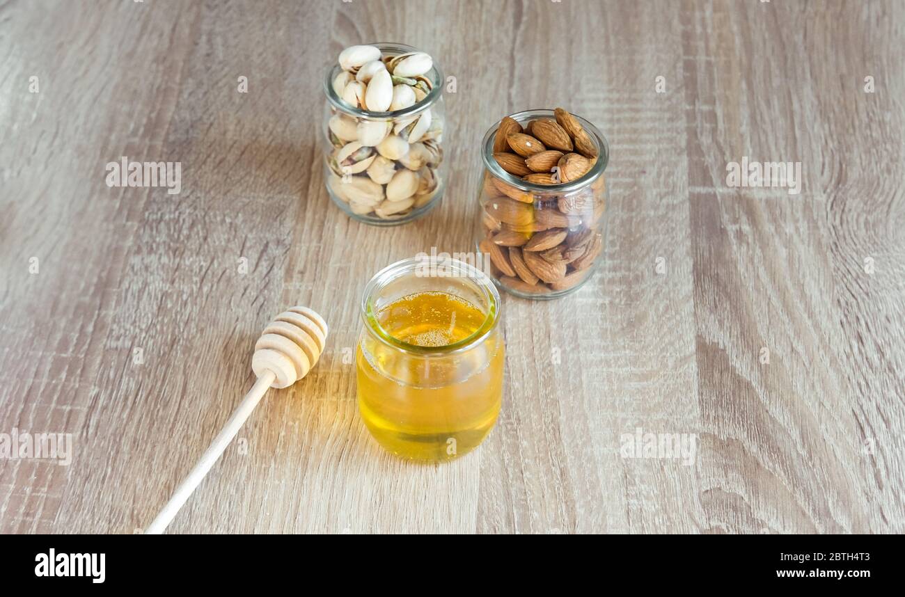 Honey and nuts Stock Photo - Alamy