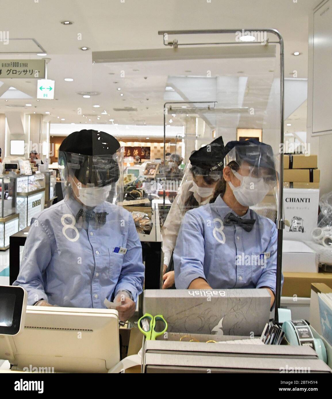 Employees wearing face shields and face masks are seen at the Matsuya ...