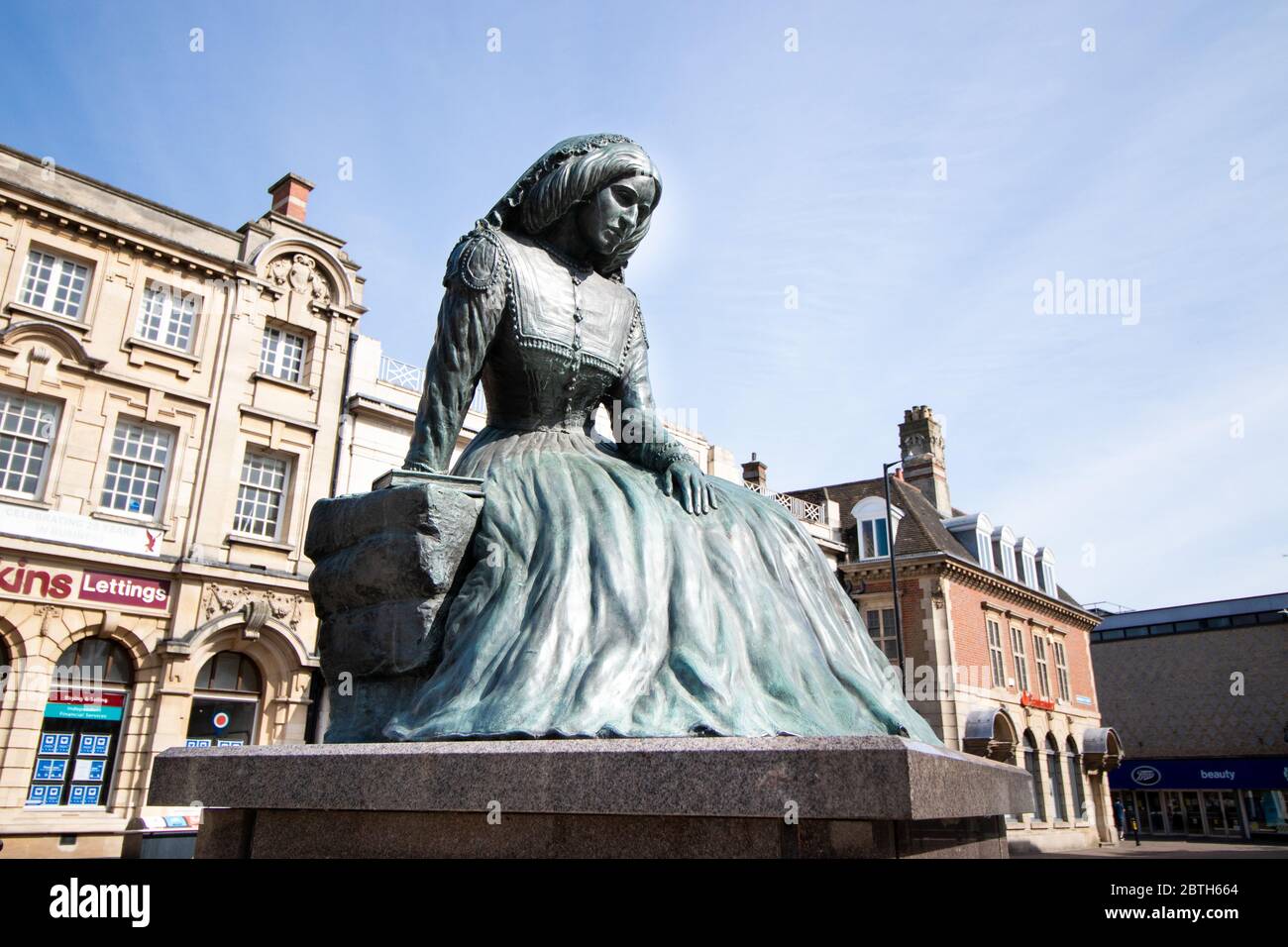The George Eliot statue situated in the shopping centre, Nuneaton Stock ...