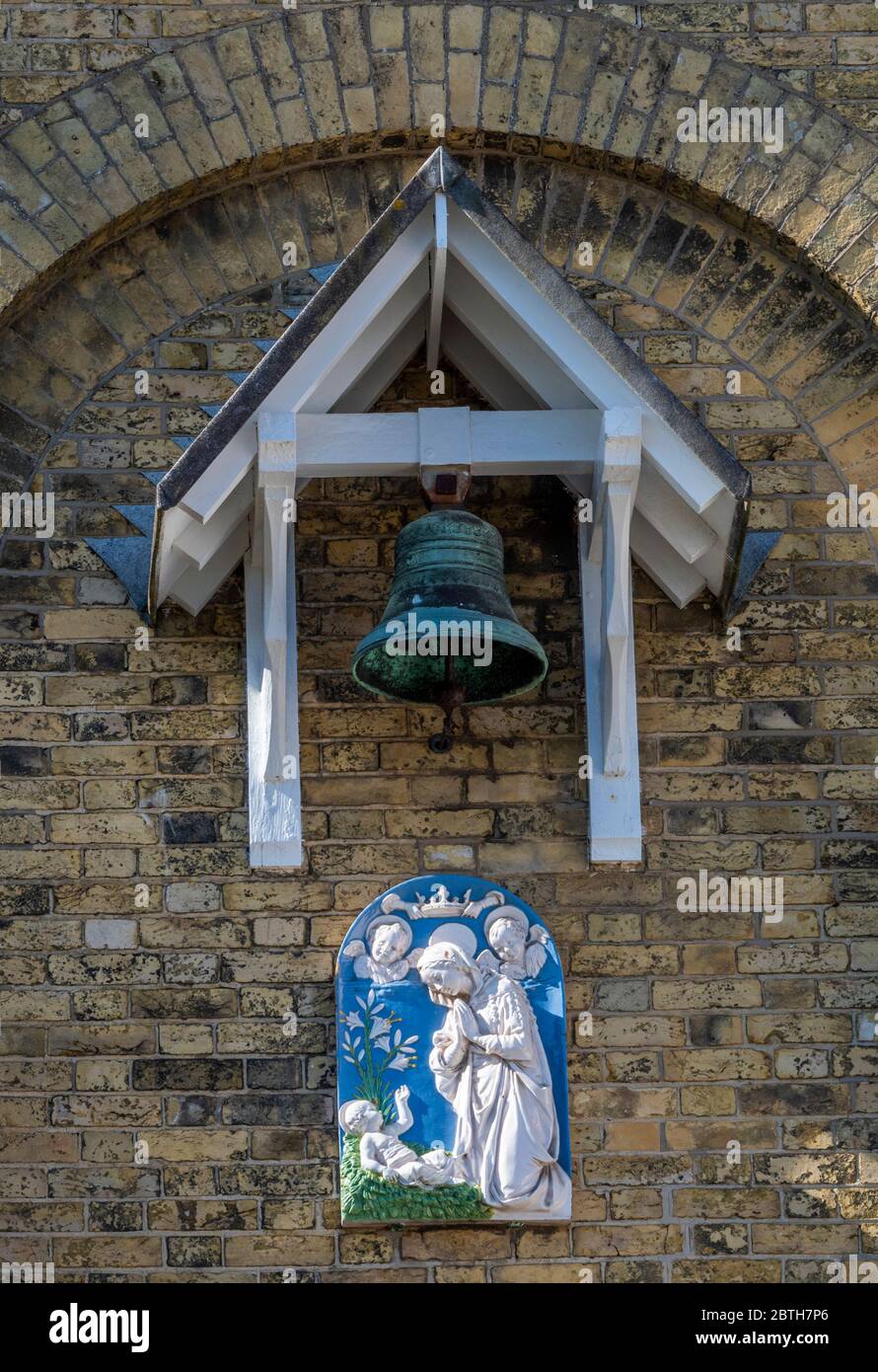an old antique church brass or bronze bell outside of a chapel with a ...