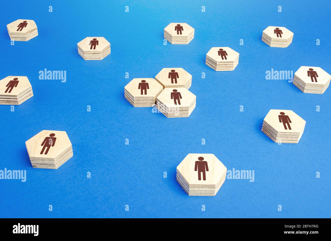 Hexagon with people gather in a group team. Merging into more ...