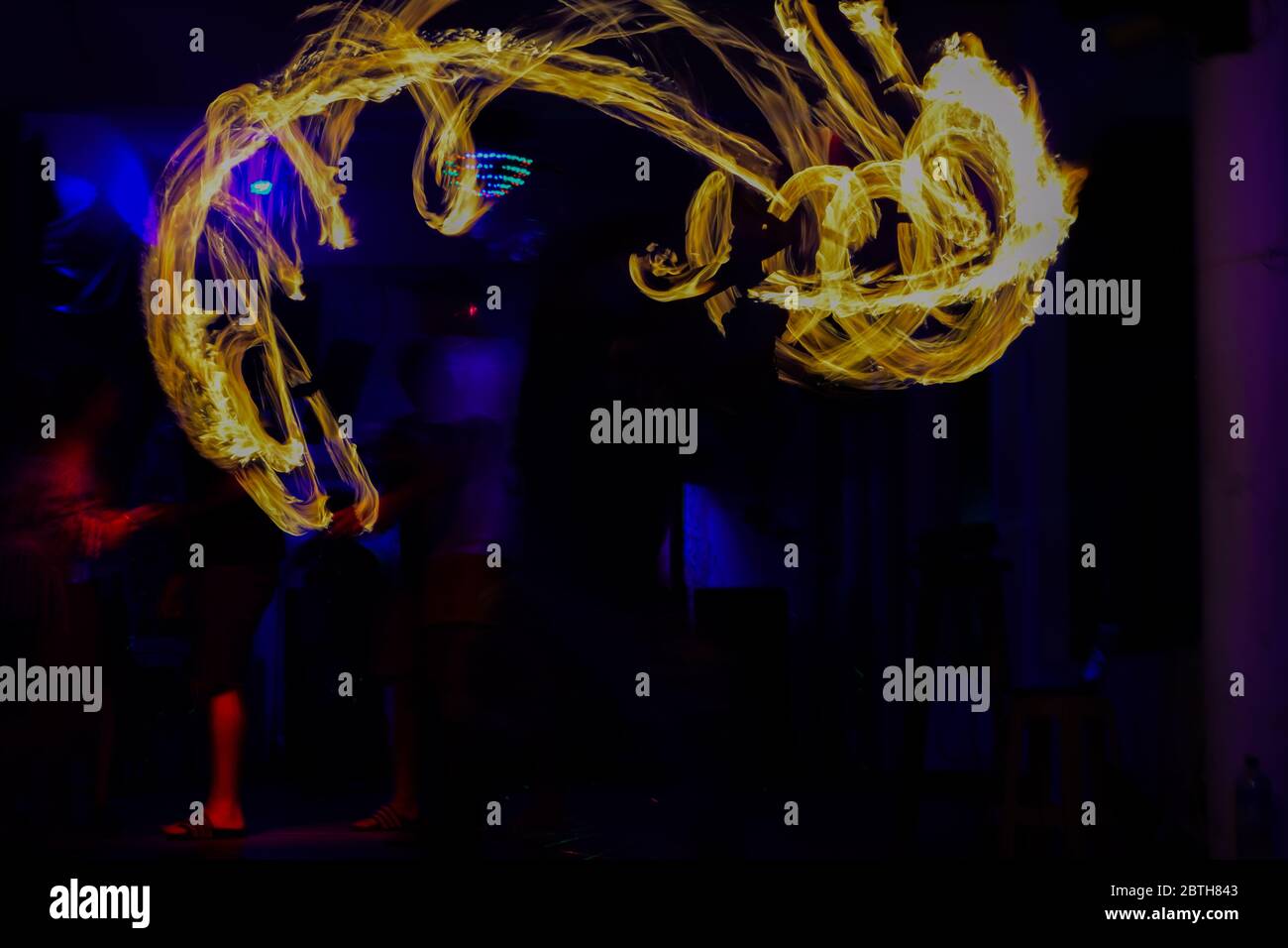 MAN DANCING AND ABSTRACT FIGURES MADE WITH FIRE Stock Photo - Alamy