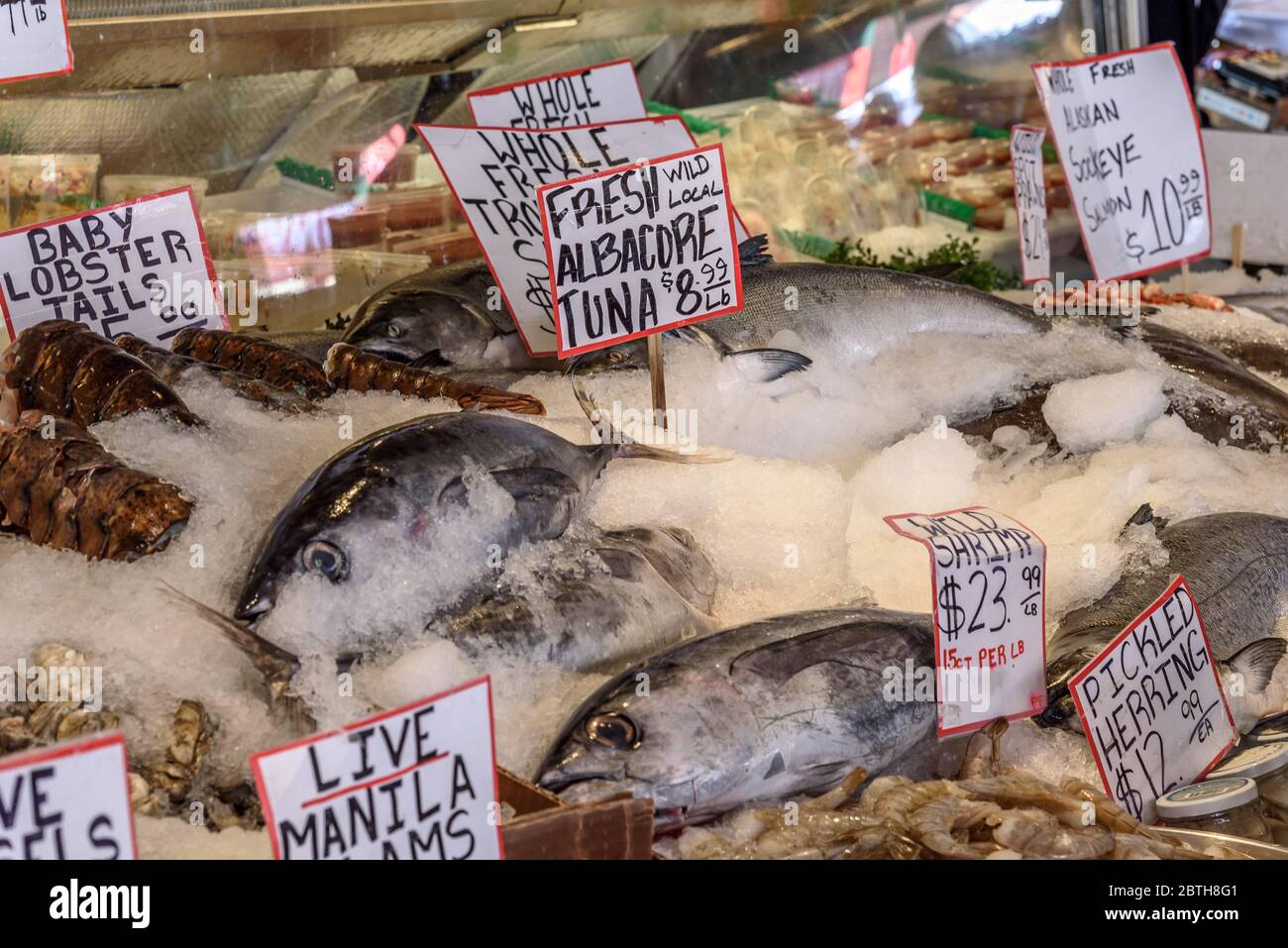 Fresh fish for sale in a farmers market. The fish is laid out in ice ...