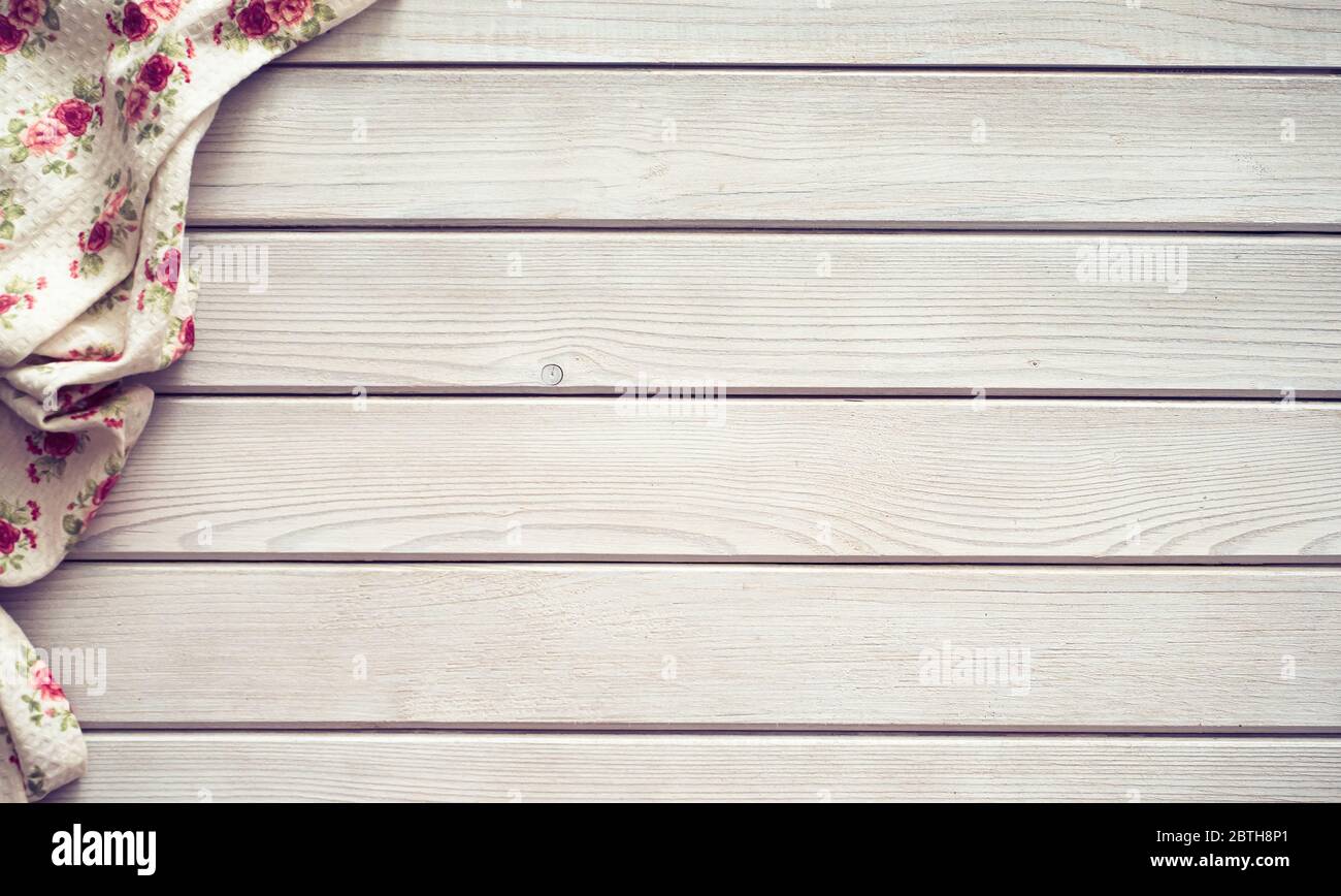 Vintage kitchen tablecloth on rustic wooden table made of white wood ...