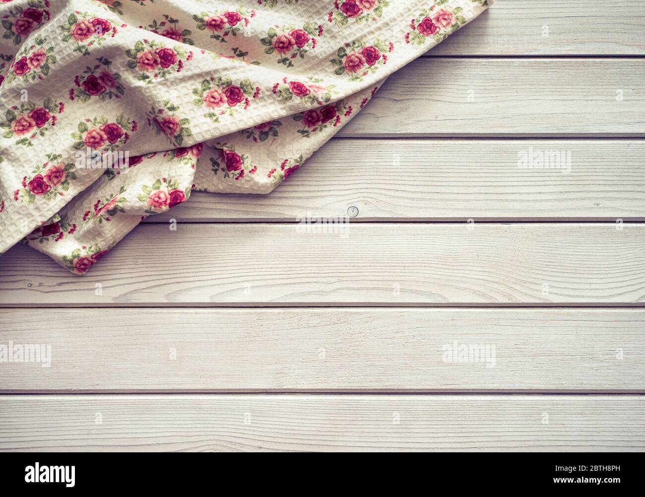 Vintage kitchen tablecloth on rustic wooden table made of white wood ...