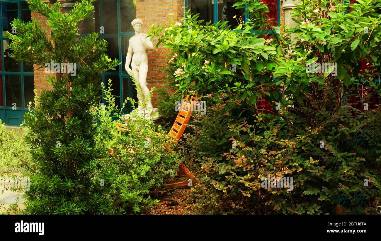 David statue model in greenery garden Stock Photo - Alamy
