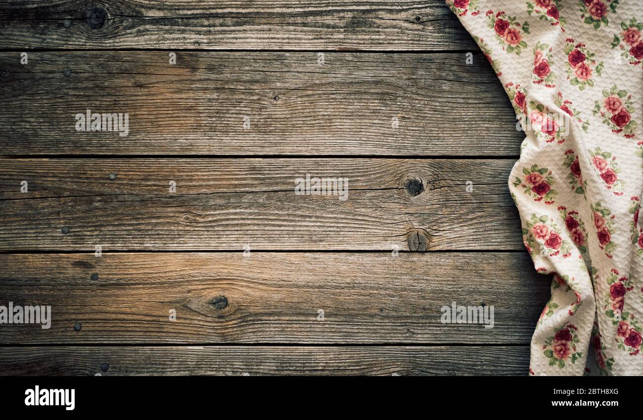 Vintage kitchen tablecloth on rustic wooden table made of rough old ...