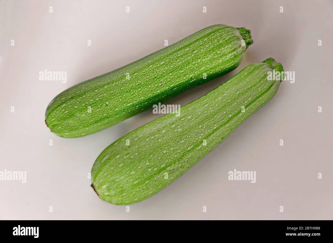 Fresh raw zucchini, courgette, Cucurbita or squash vegetable marrow on ...
