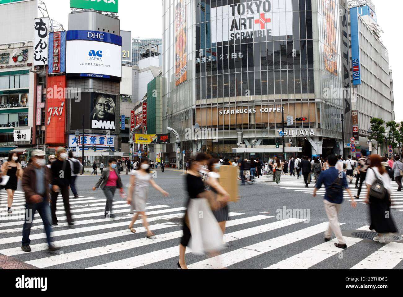 Tokyo, Japan, 26th May 2020. People wearing protective masks walk in ...