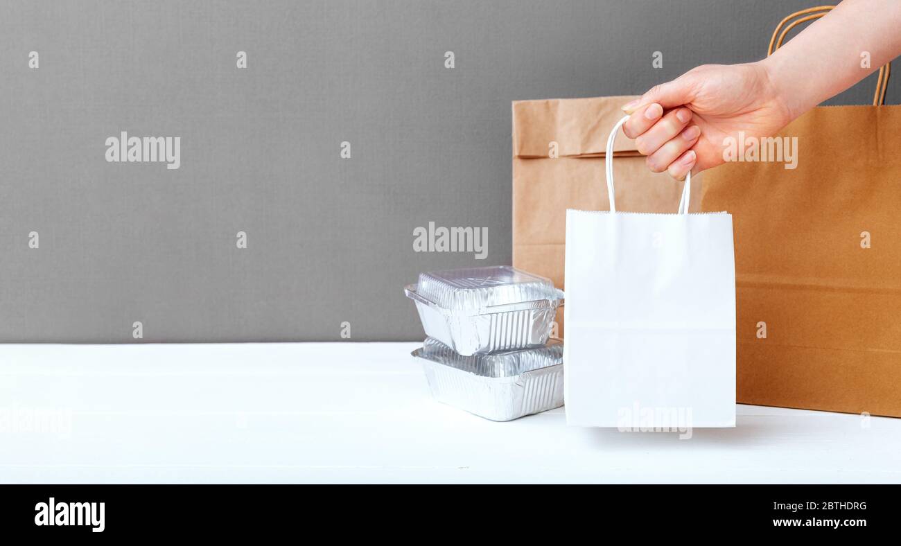 Food delivery service containers hi-res stock photography and images ...