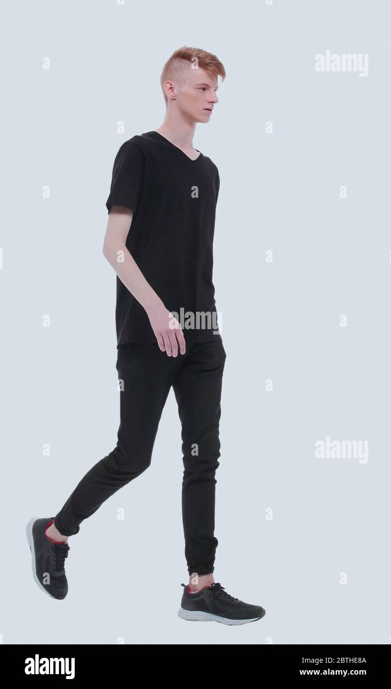 in full growth. modern guy student slowly goes forward Stock Photo - Alamy