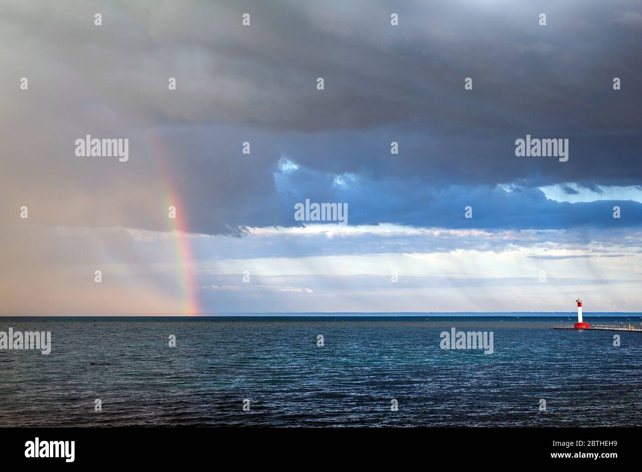 Rainbow over lake Ontario Stock Photo - Alamy