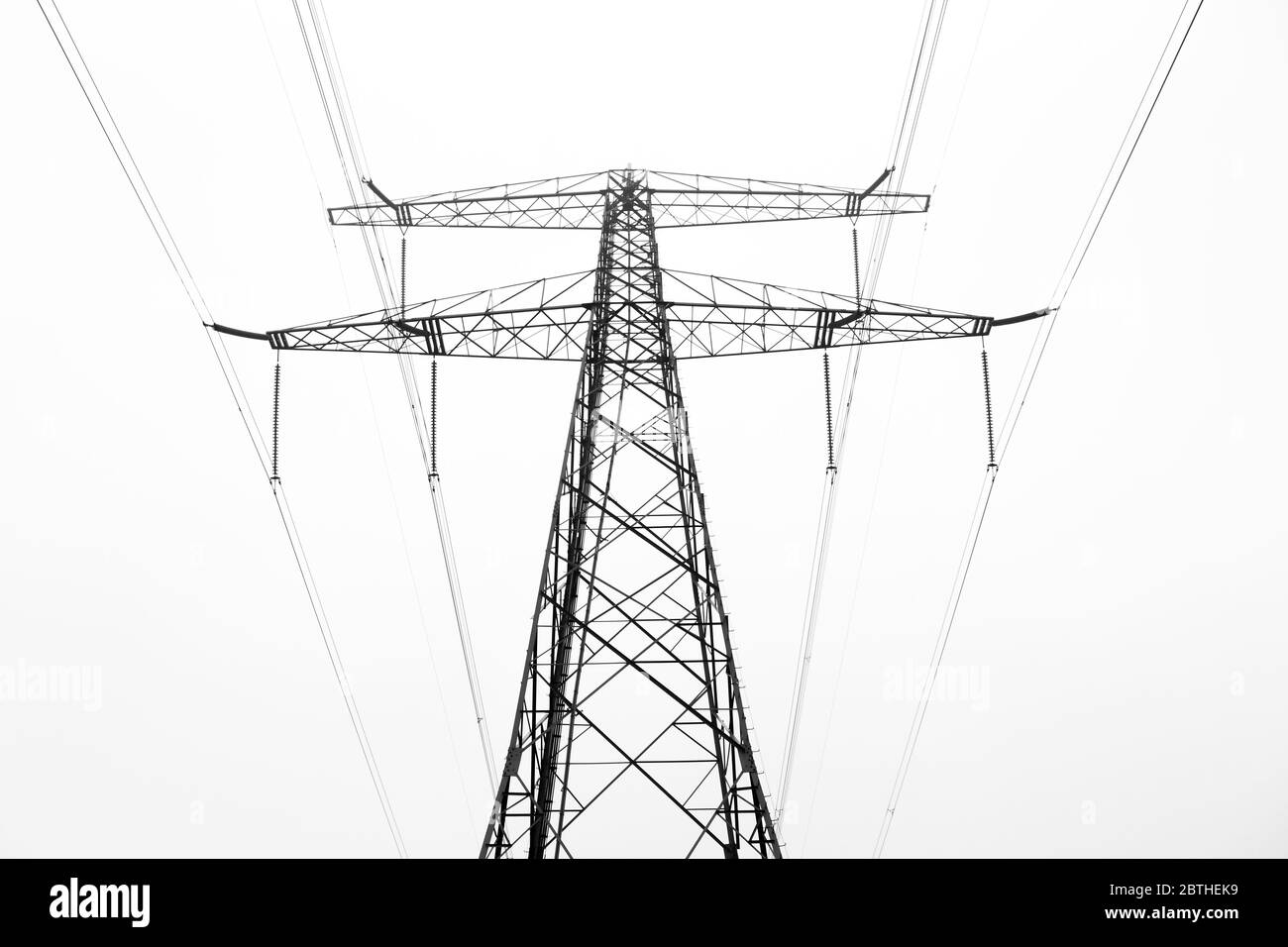 Power pylon from below on a foggy morning in the Netherlands Stock ...