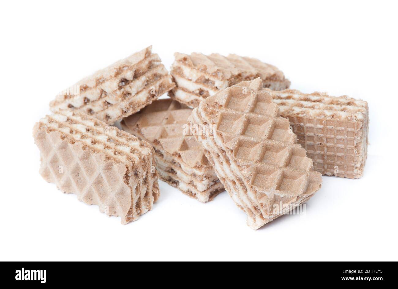 Group of small multilayer waffles isolated over white background Stock ...