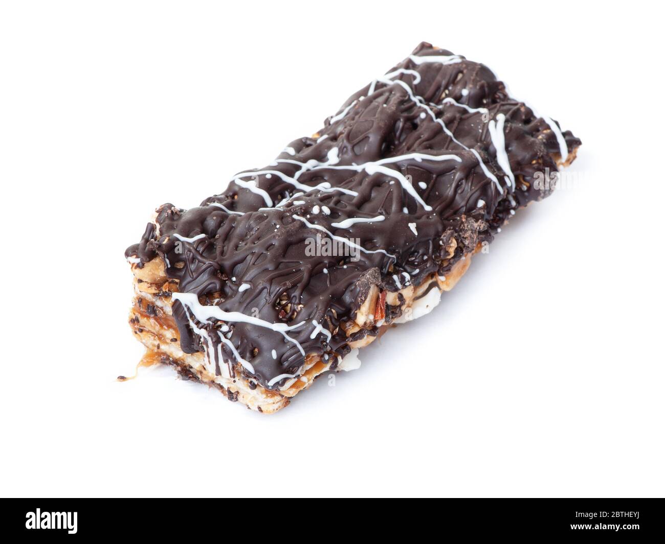 Sweet chocolate icing puff cake isolated on white background Stock ...