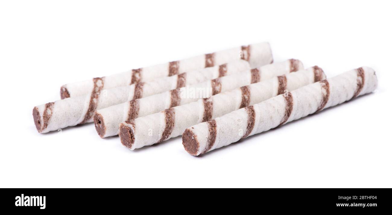 Group of sweet spiral tubes isolated on white background Stock Photo ...